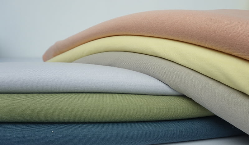 Kenali Kelembutan Bahan Kaos PE Soft Karuniatex